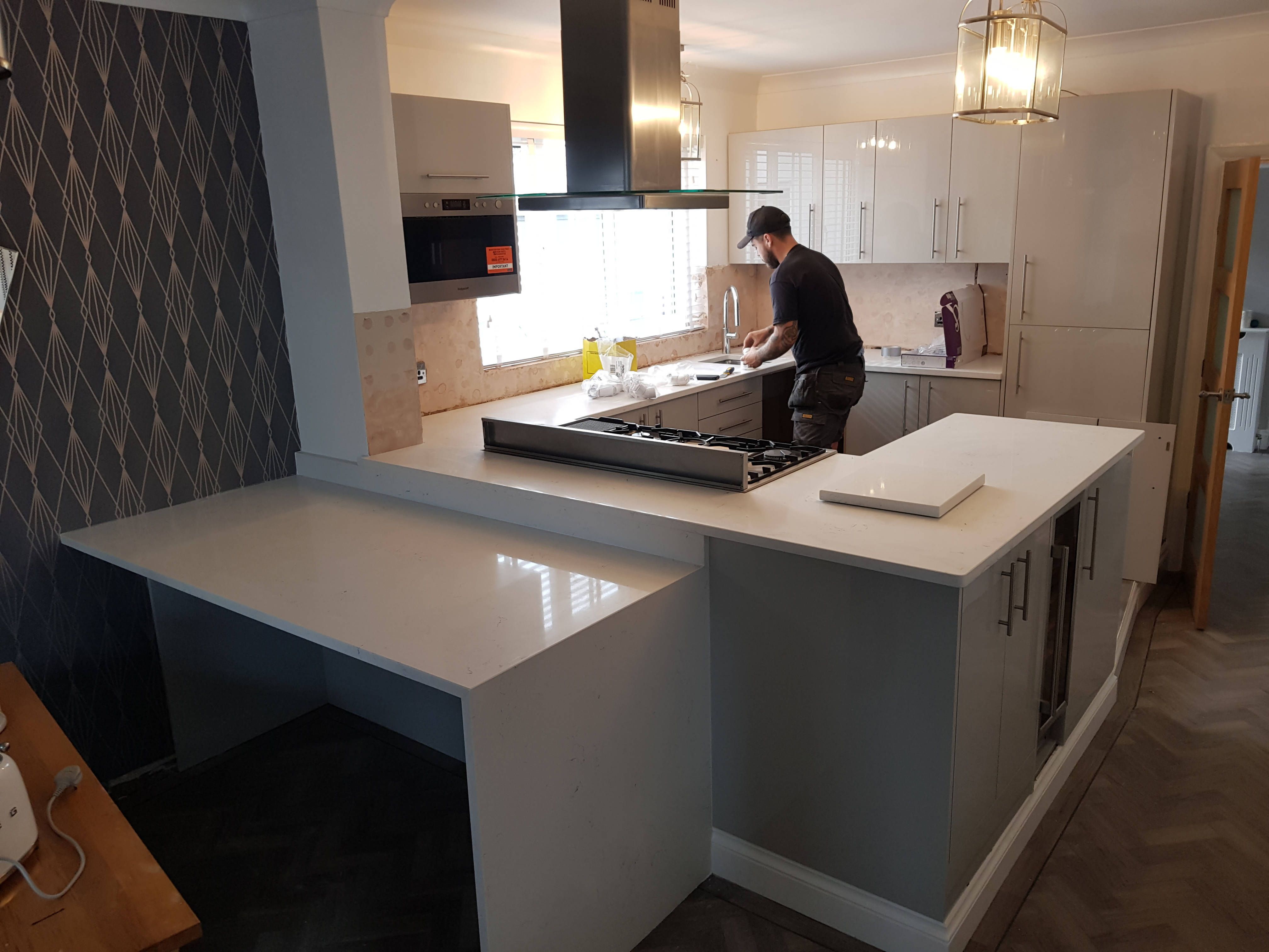 Carrara Quartz Peninsula KitchenCustom marble fabrication, Custom ...